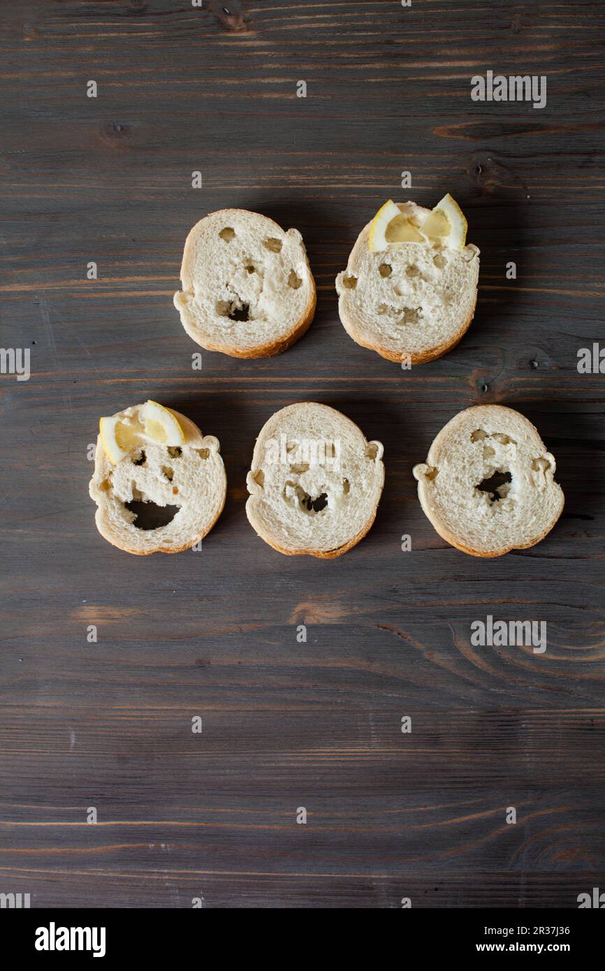 Faces from bread Stock Photo - Alamy