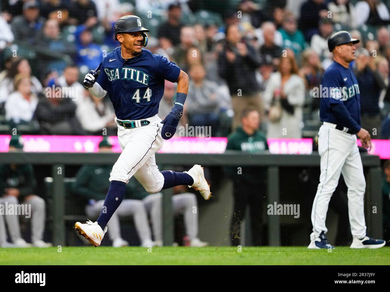 Seattle Mariners' Julio Rodriguez runs home to score on a single from ...