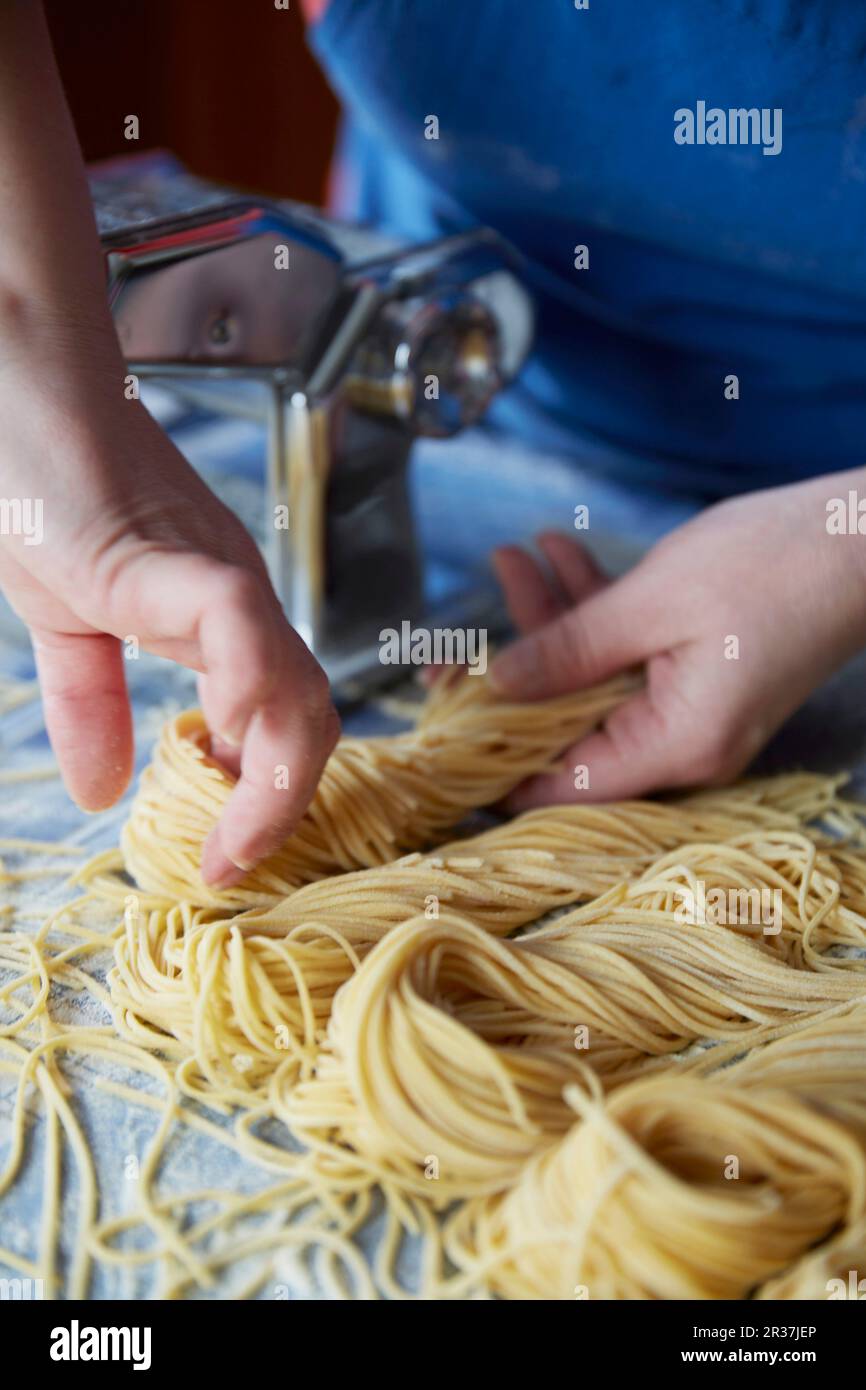 Spaghetti pasta production hi-res stock photography and images - Alamy