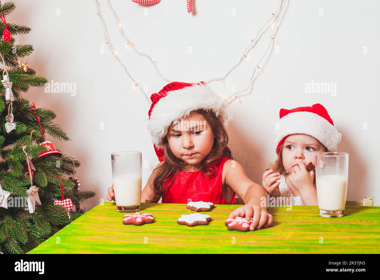 Christmas girls tree hi-res stock photography and images - Alamy