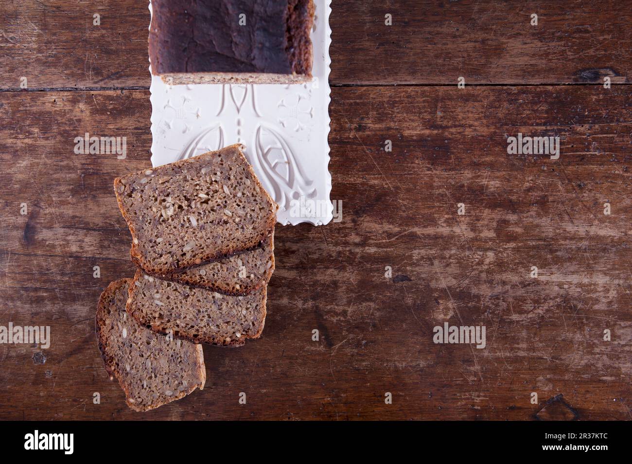 Rye bread with linseed, sunflower seeds and unripe spelt Stock Photo ...