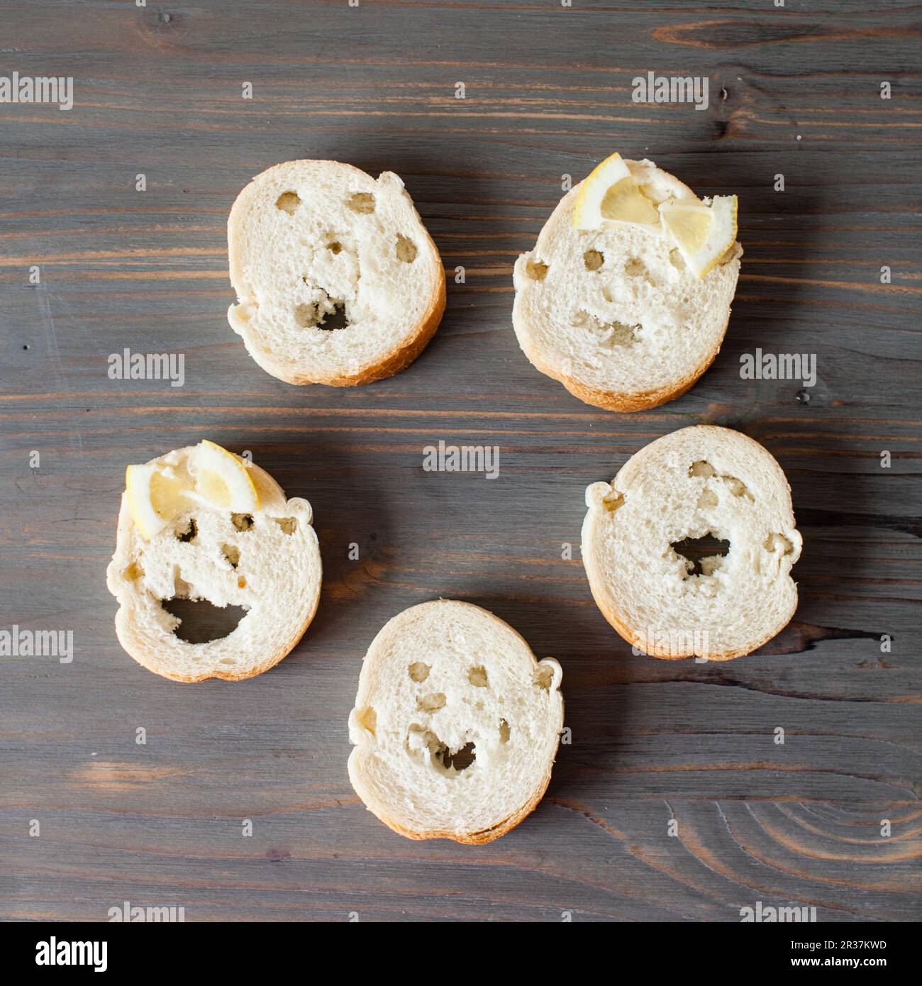 Faces from bread Stock Photo - Alamy