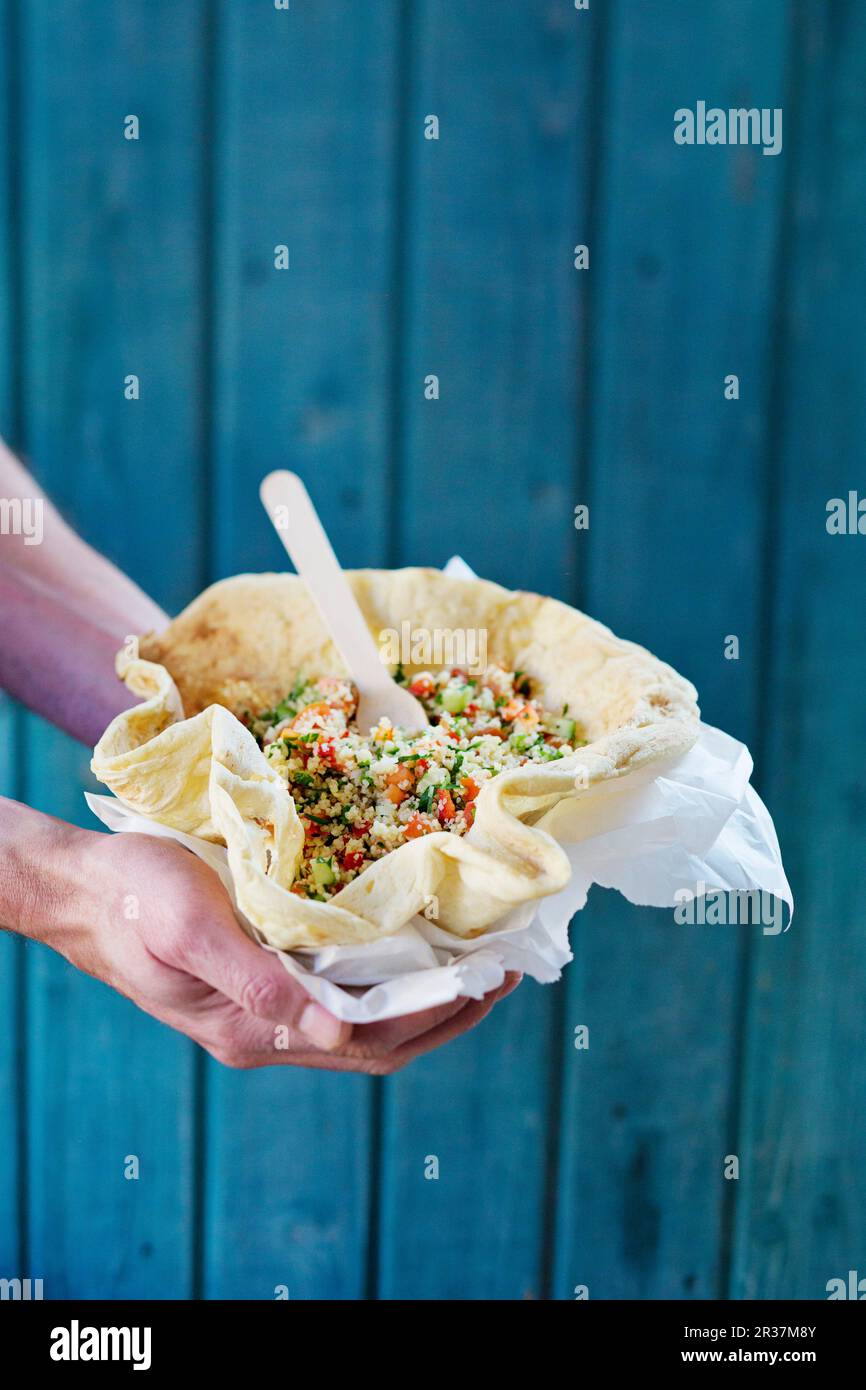 Tabouleh in a flatbread bowl Stock Photo - Alamy