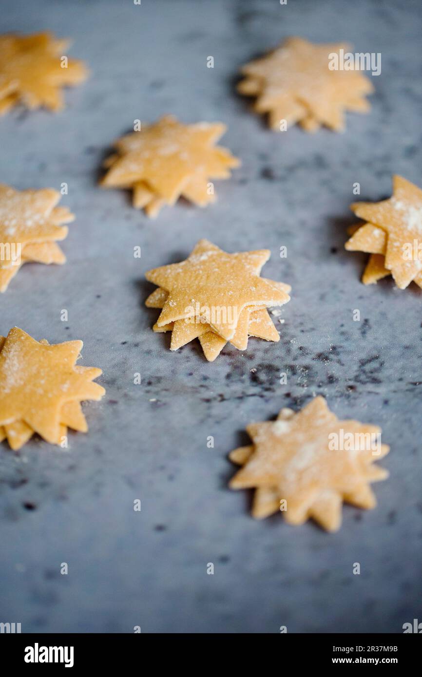 Small stacks of pasta stars Stock Photo - Alamy