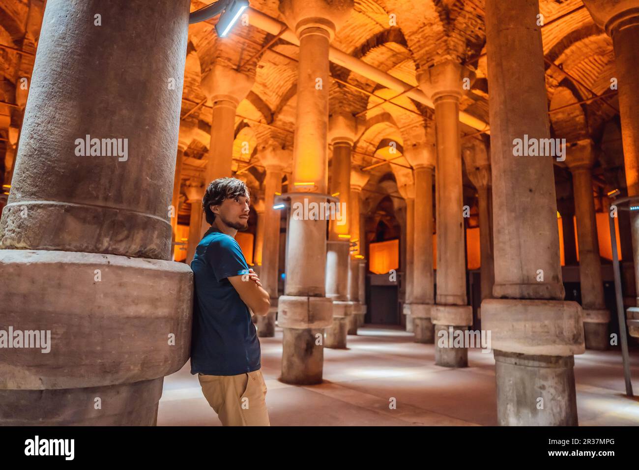 Man tourist enjoying Beautiful cistern in Istanbul. Cistern ...