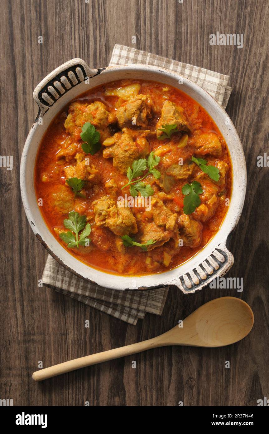 Lamb curry with coriander (India Stock Photo - Alamy