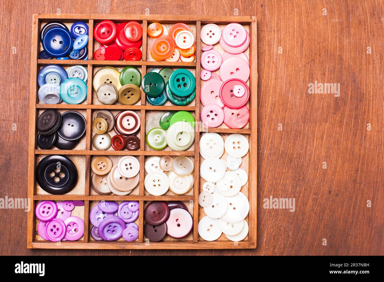 Colorful buttons in box Stock Photo - Alamy
