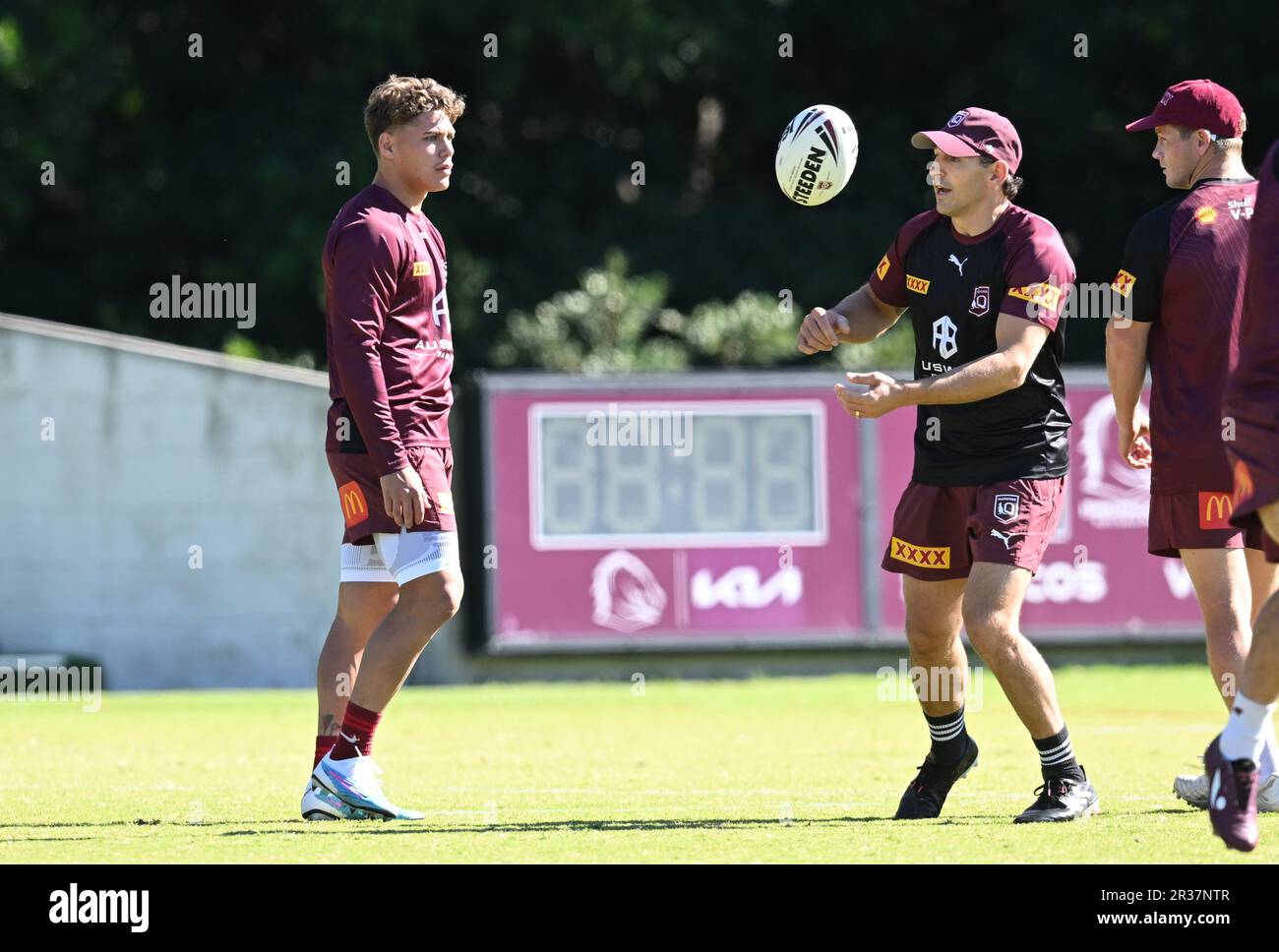 Reece Walsh (left) and Maroons coach Billy Slater (centre) are seen ...