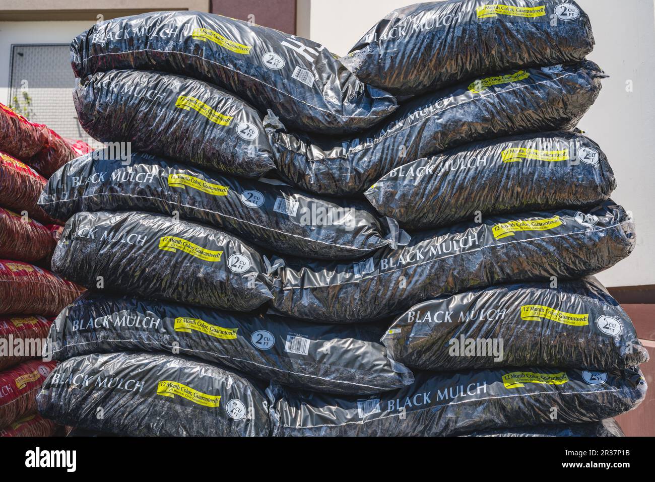 Santa Maria, California, USA - May 17, 2023. Mulch in plastic bags ...