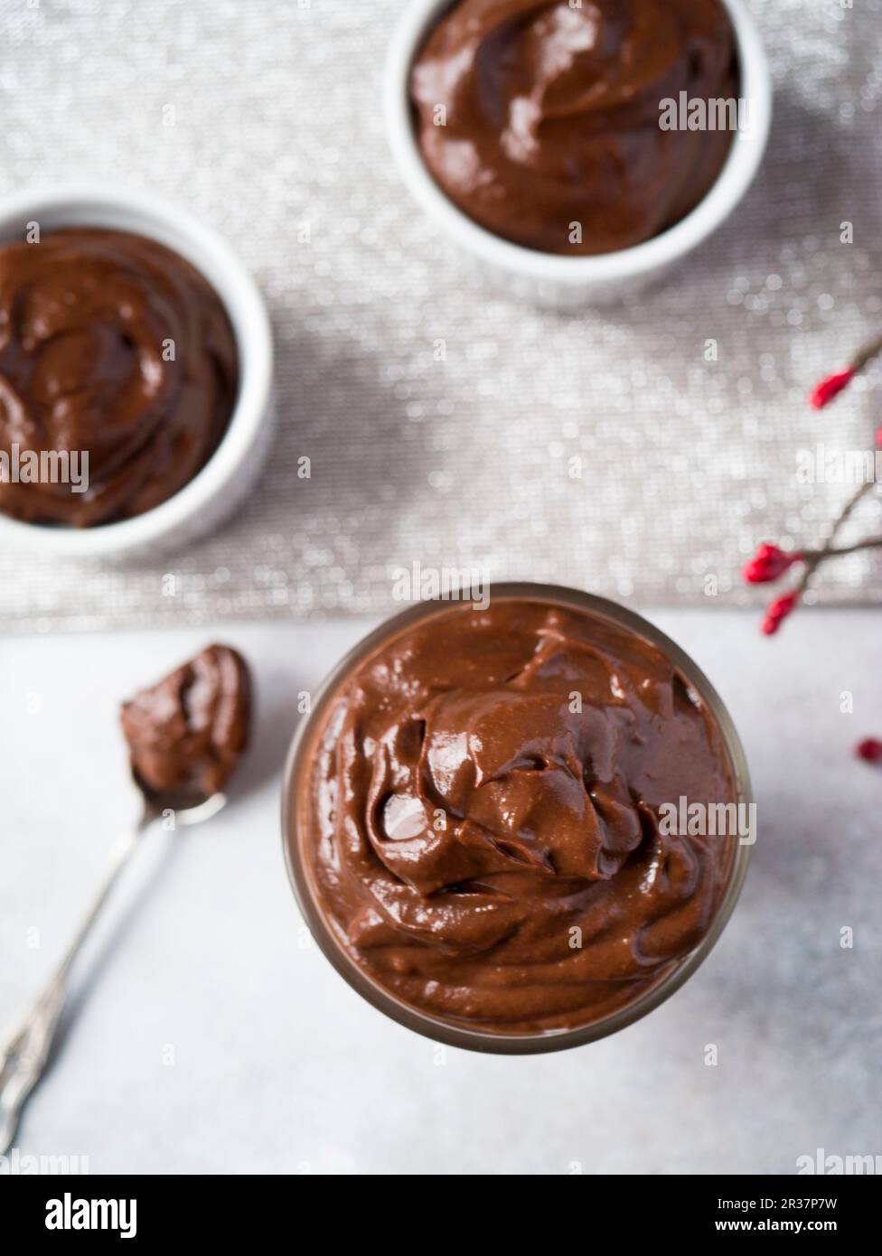 Creamy chocolate pudding with spoon Stock Photo - Alamy