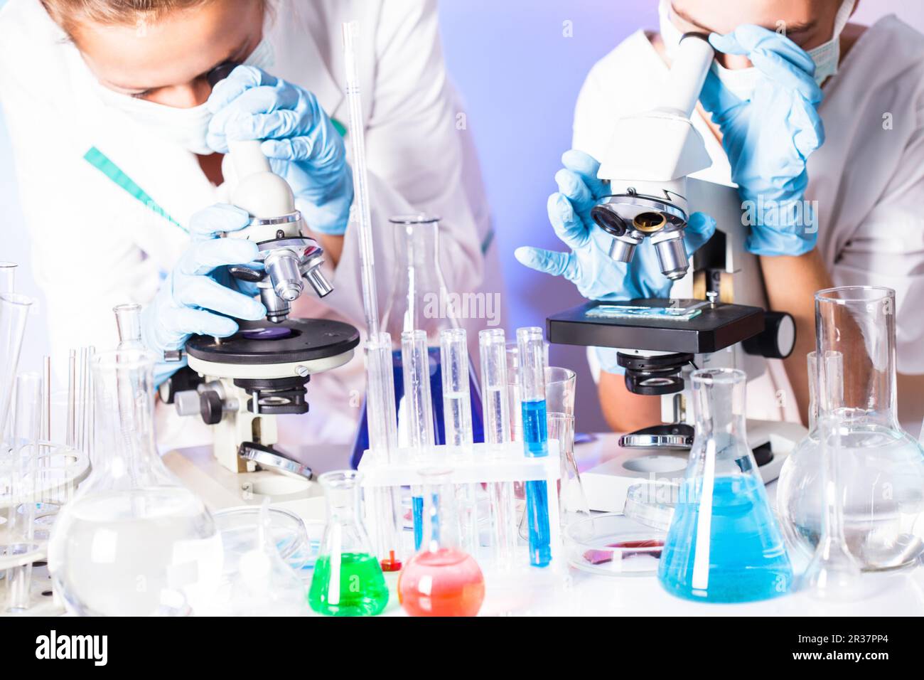 Female scientist in blue laboratory hi-res stock photography and images ...