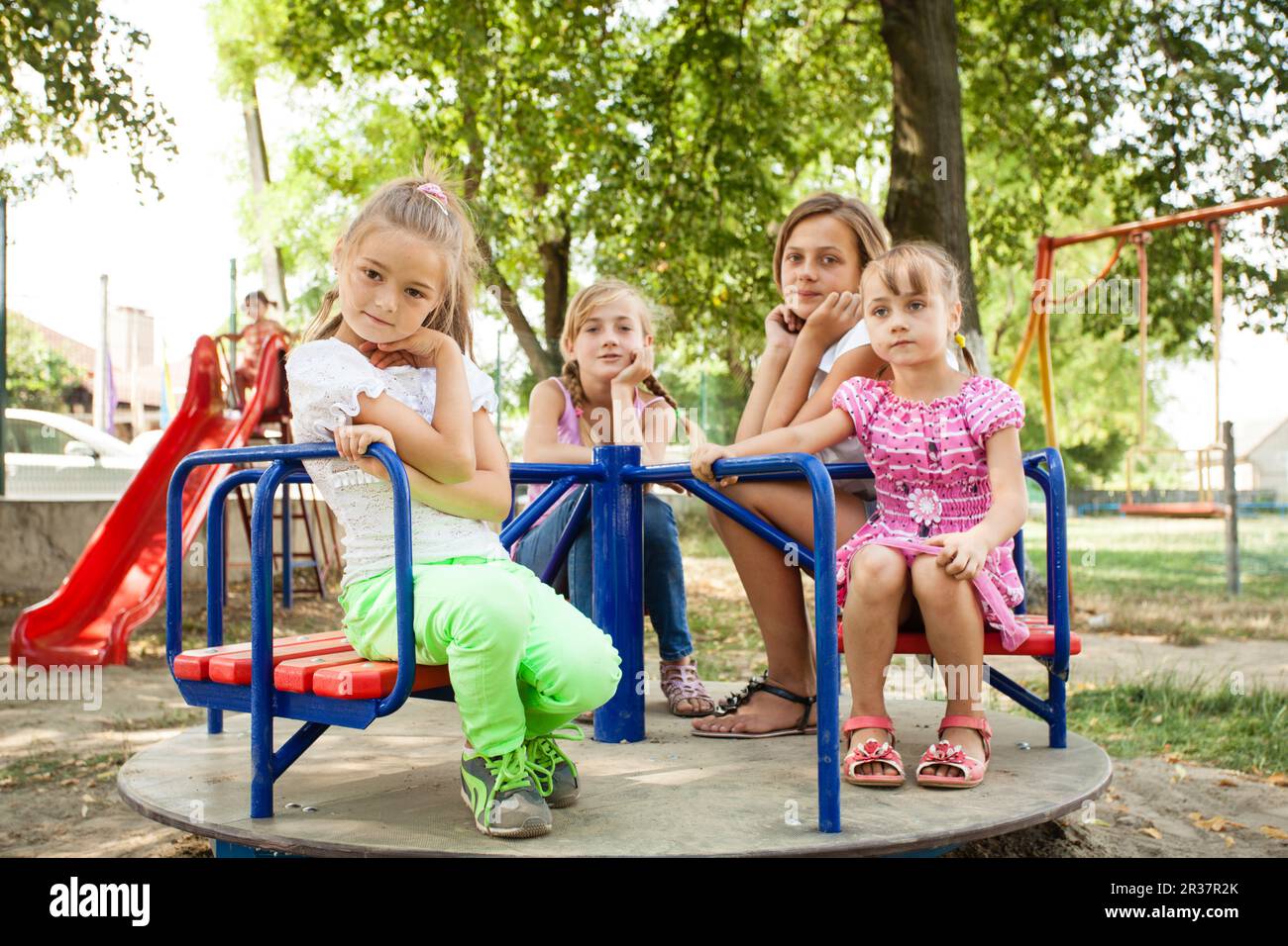 Kids on the carousel Stock Photo - Alamy
