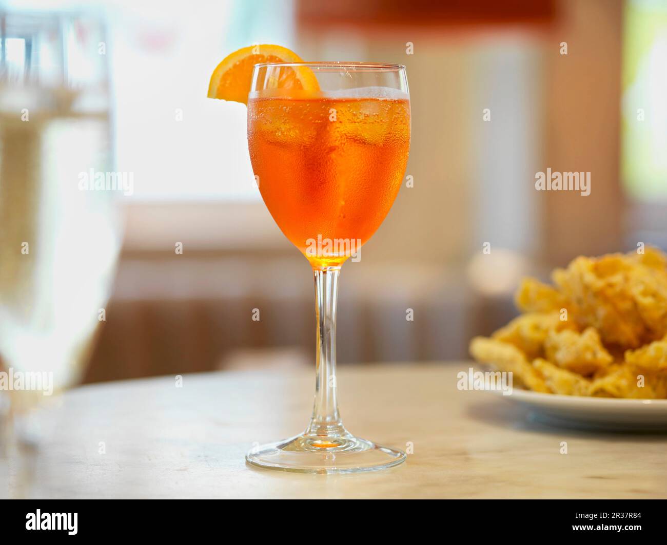 Aperol spritz on a restaurant table Stock Photo - Alamy