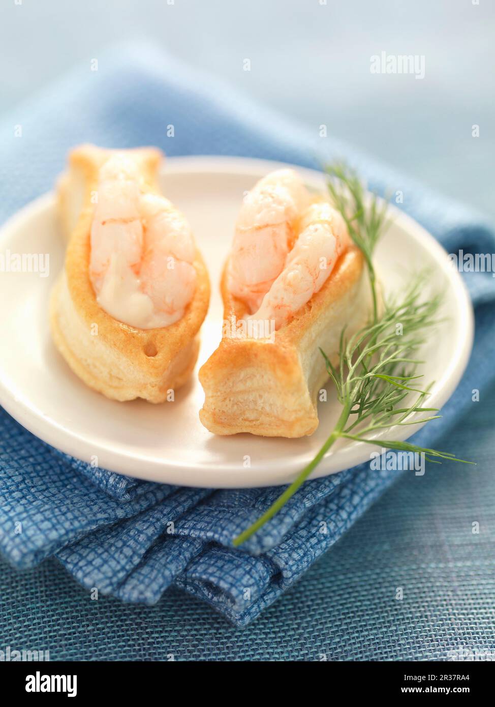 Prawn cocktail in little flaky pastry fish Stock Photo - Alamy