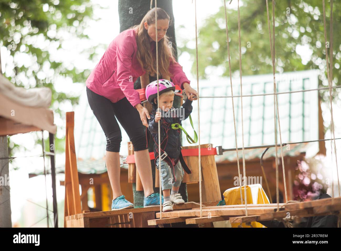The obstacle course in adventure park Stock Photo - Alamy