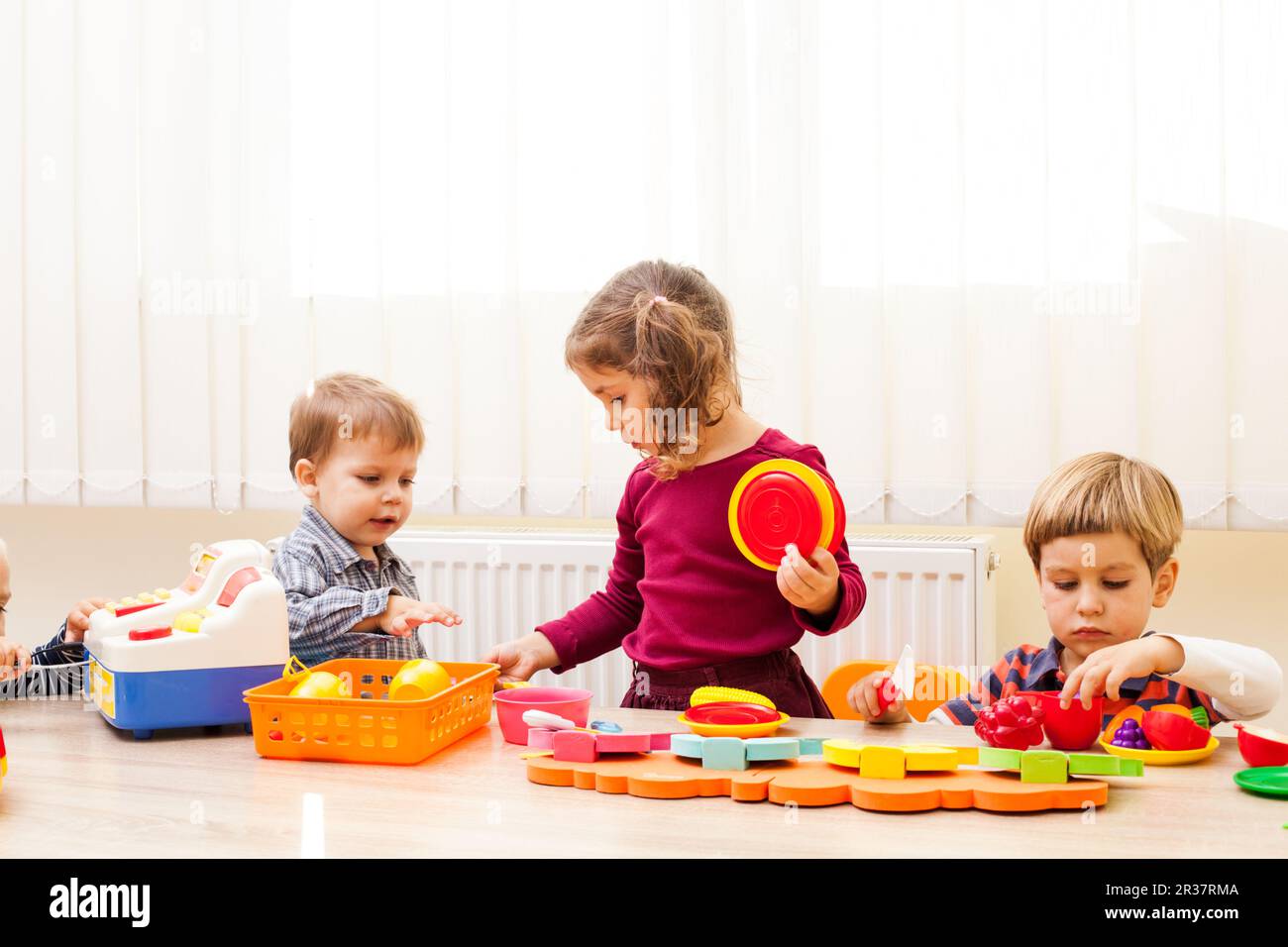 Children playing cooks Stock Photo - Alamy