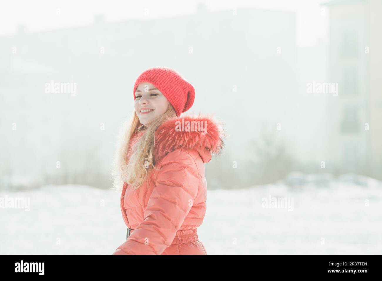 Girl in red parka Stock Photo - Alamy