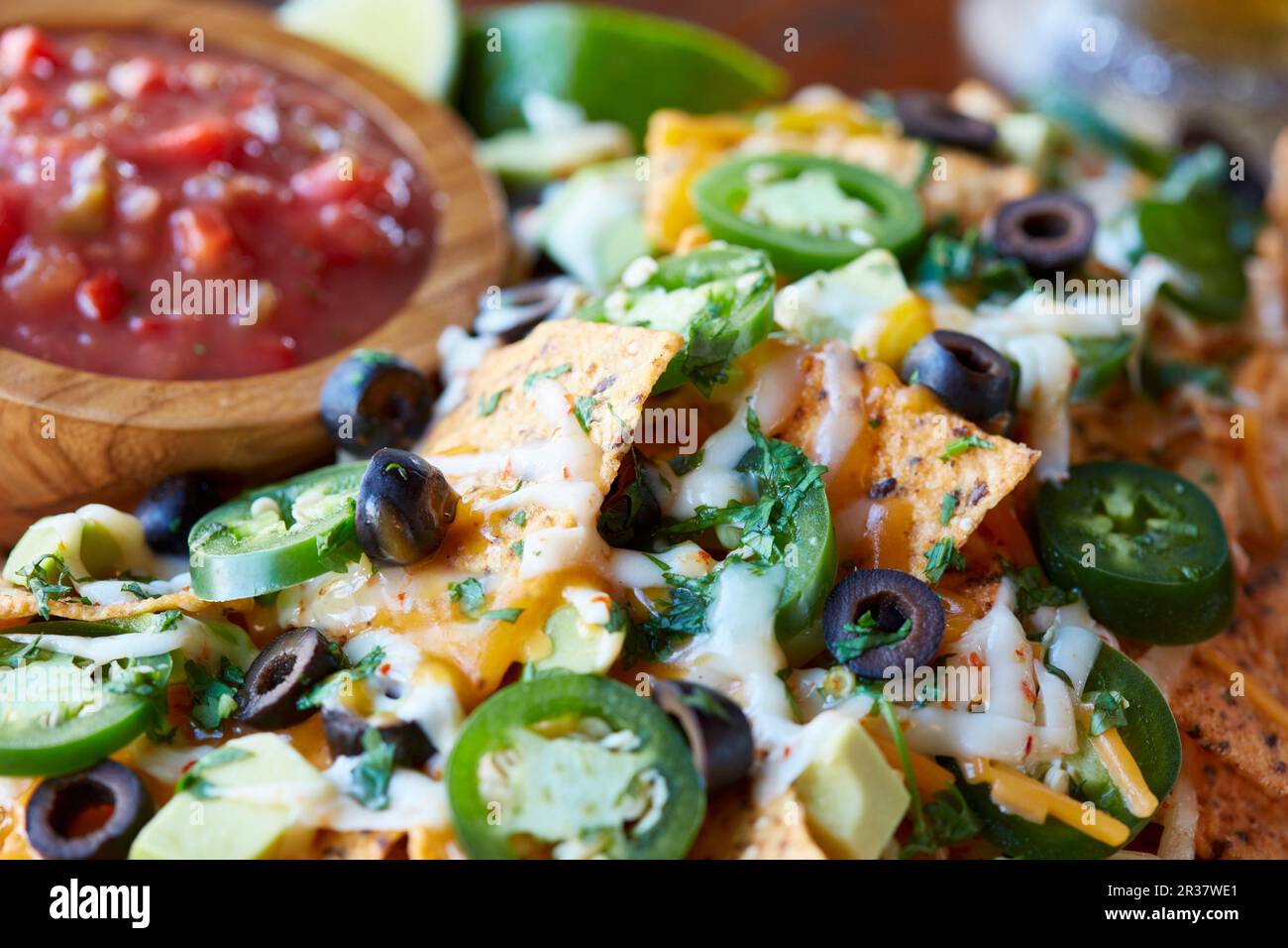 Nachos with cheese, jalapenos, black olives and salsa (Mexico Stock ...