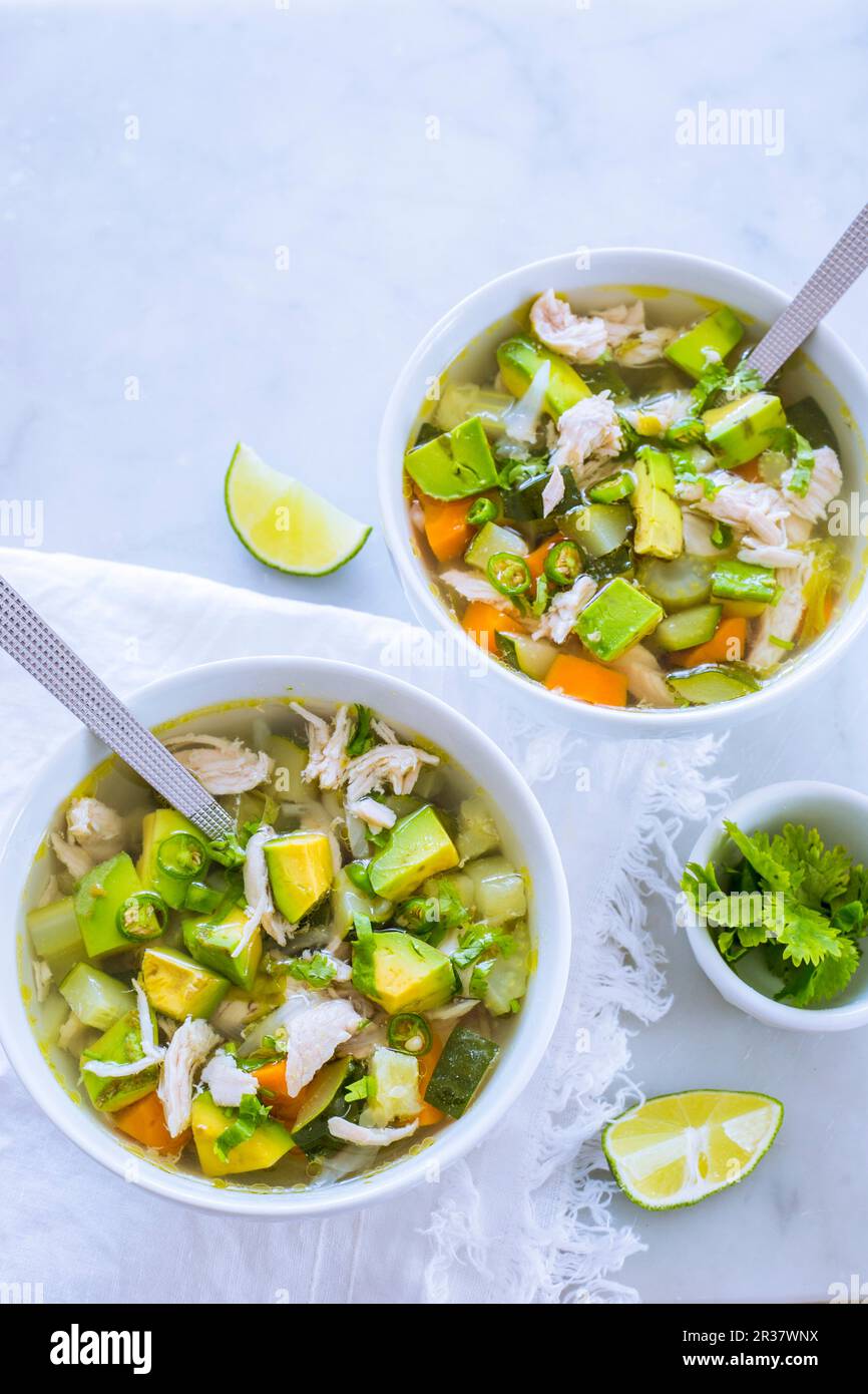 Chicken soup with avocado and carrot (Mexico Stock Photo - Alamy