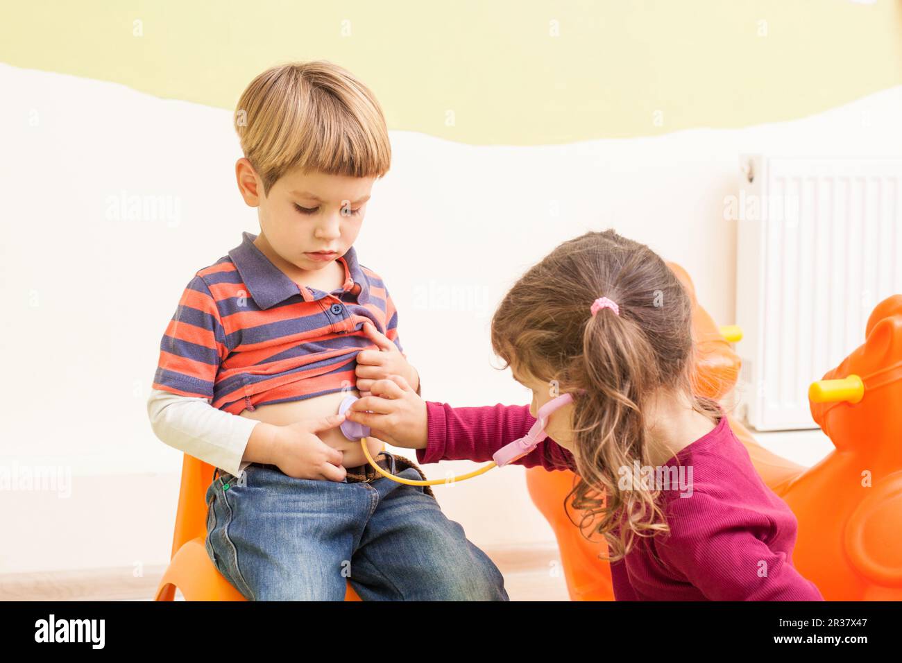 Children playing doctor and patient Stock Photo - Alamy