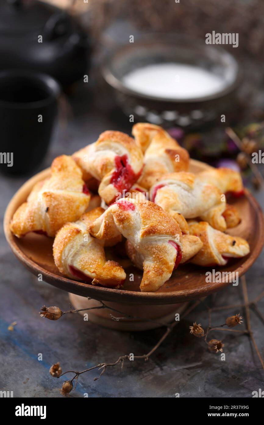 Cherry-filled mini croissants Stock Photo - Alamy