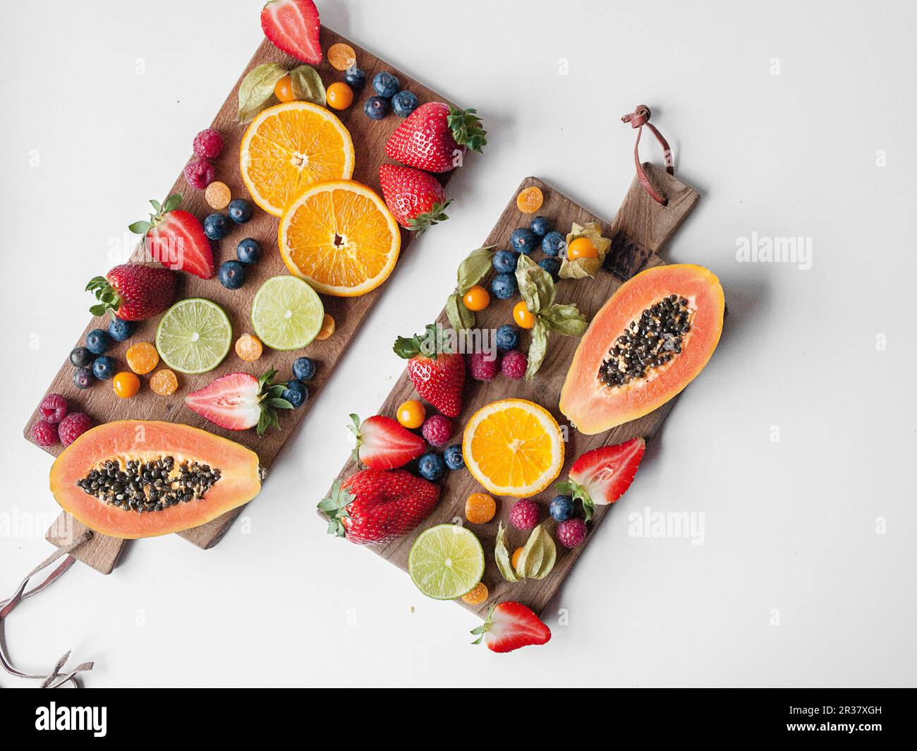 Fresh fruits arranged on two wooden boards (seen from above Stock Photo ...