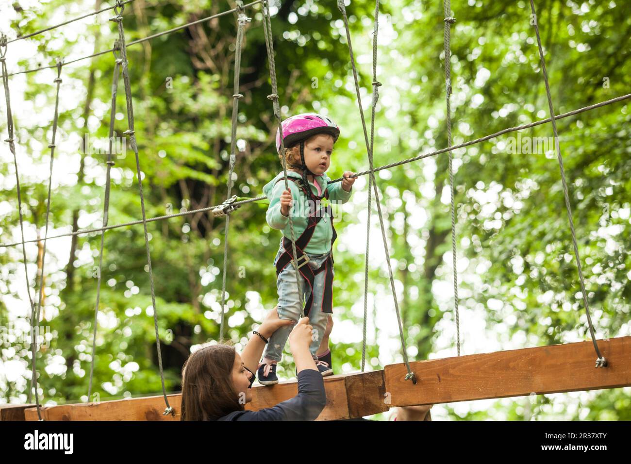 Children in a adventure playground Stock Photo - Alamy