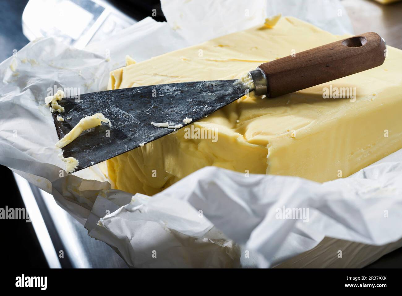 Butter and a scraper Stock Photo - Alamy