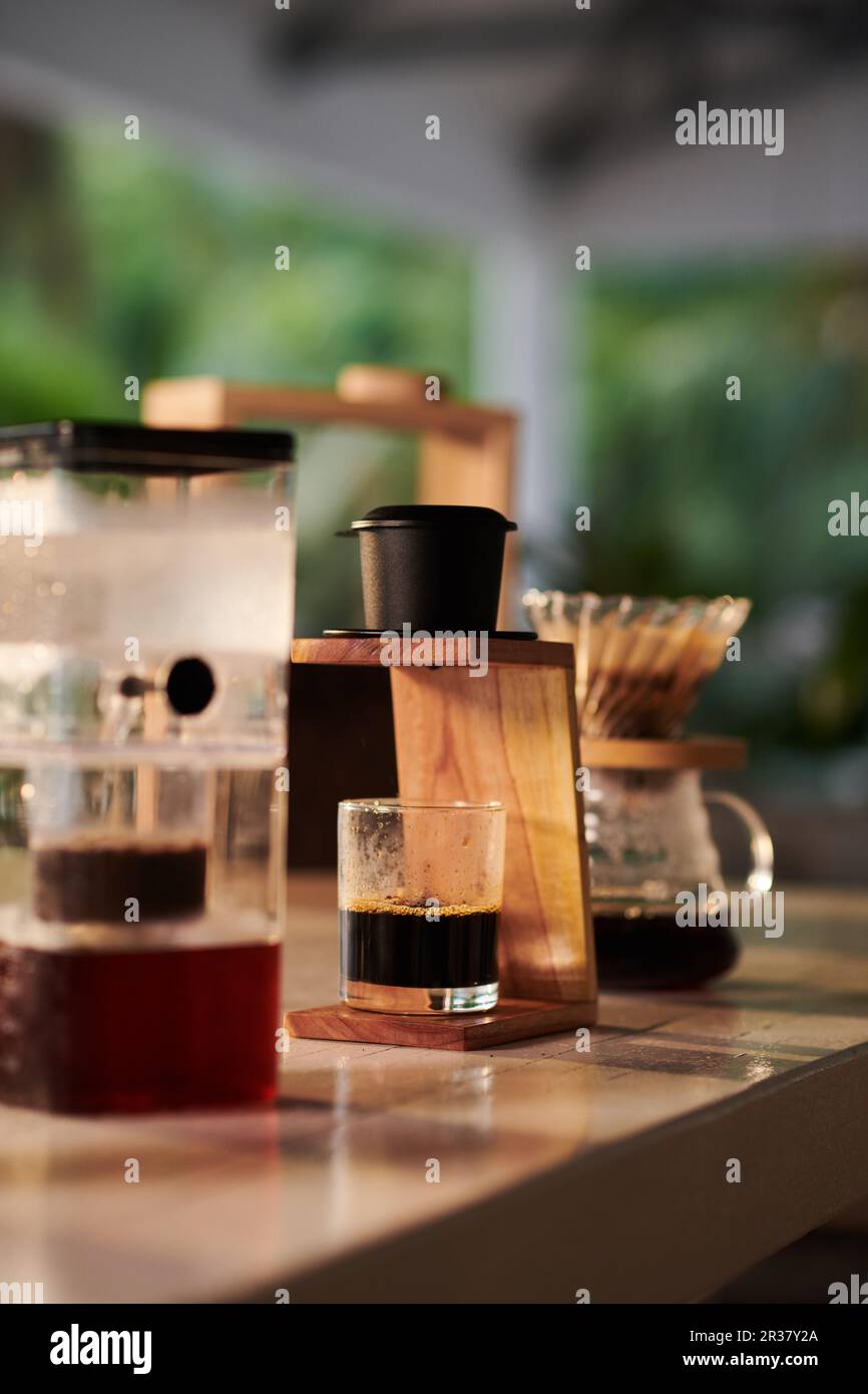 Glassware for making various style coffee on bar counter Stock Photo ...