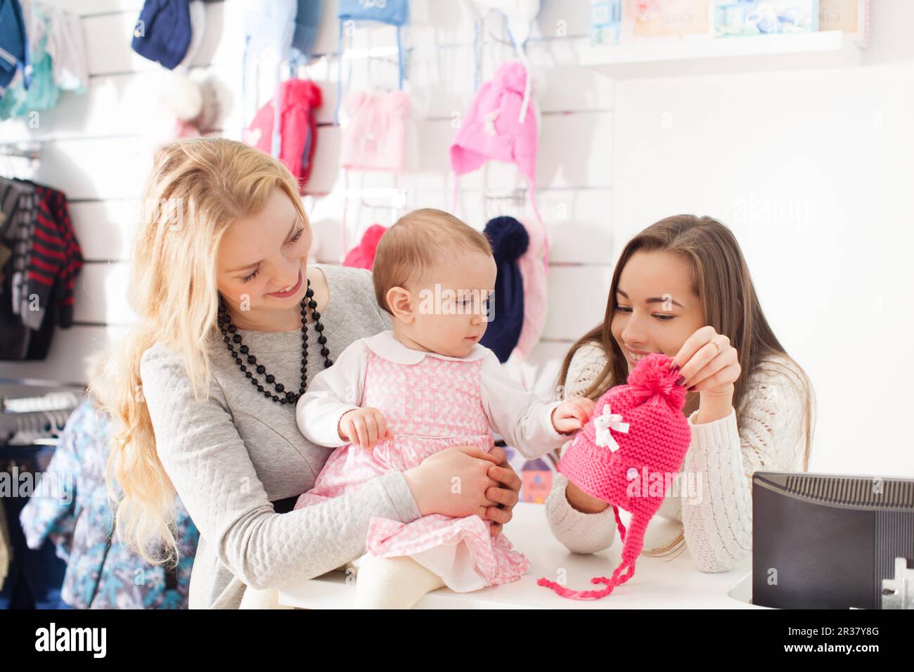 Girls in a clothing store Stock Photo - Alamy