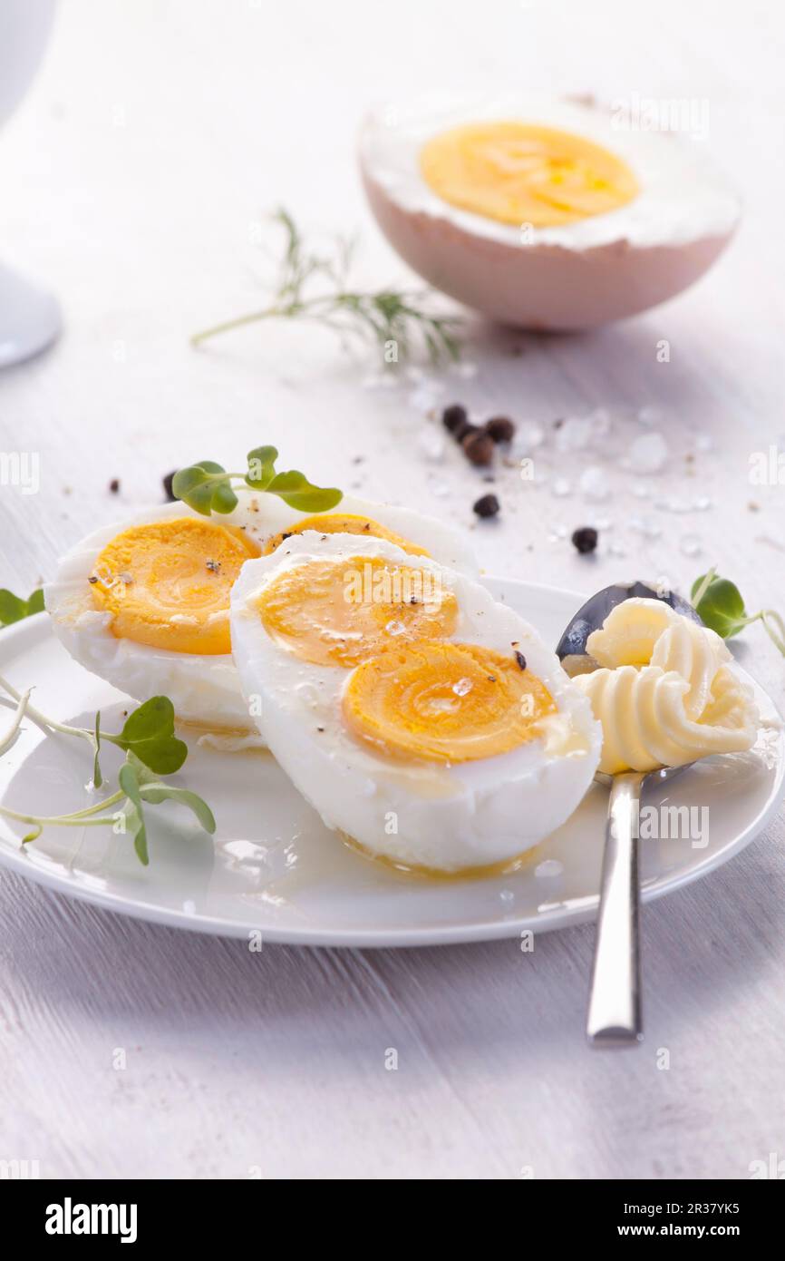 Half an egg with two yolks Stock Photo - Alamy