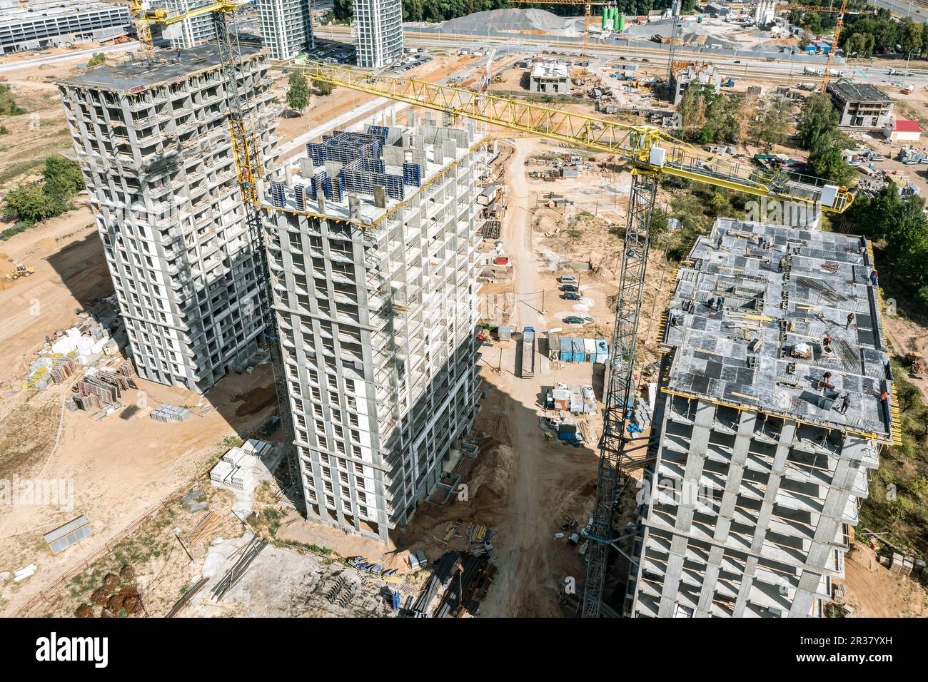 closeup aerial view of high-rise apartment buildings under construction ...
