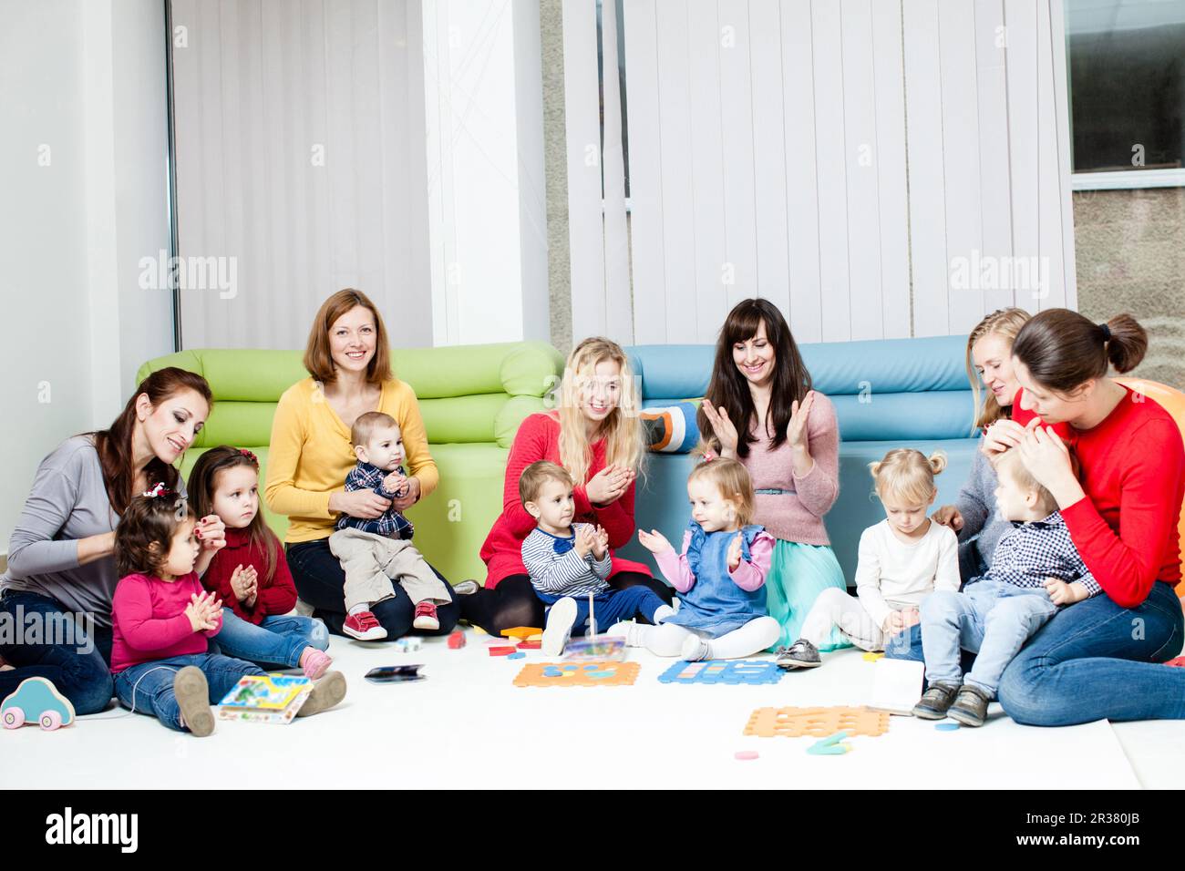 Mothers and children Stock Photo - Alamy