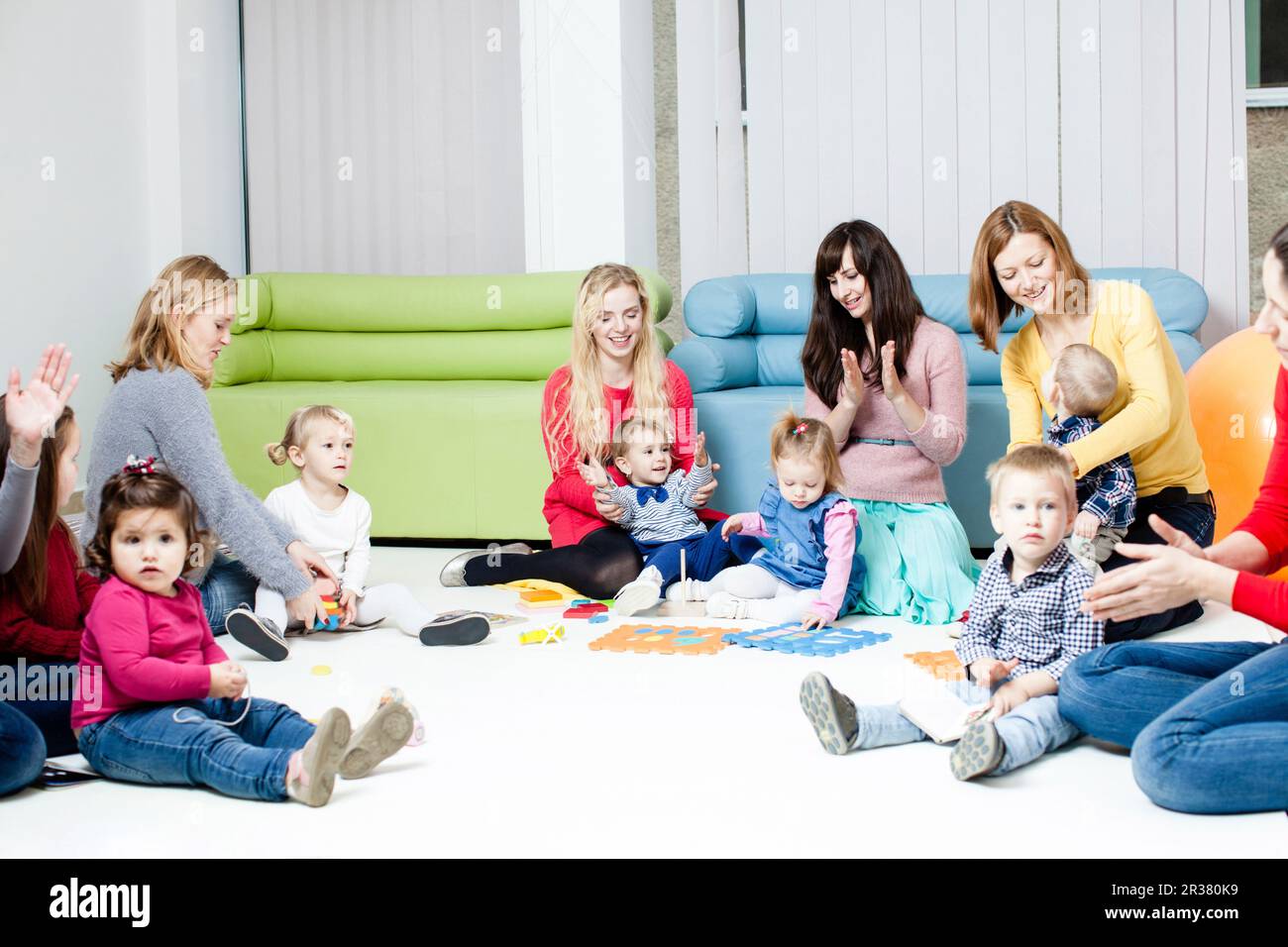 Mothers and children Stock Photo - Alamy