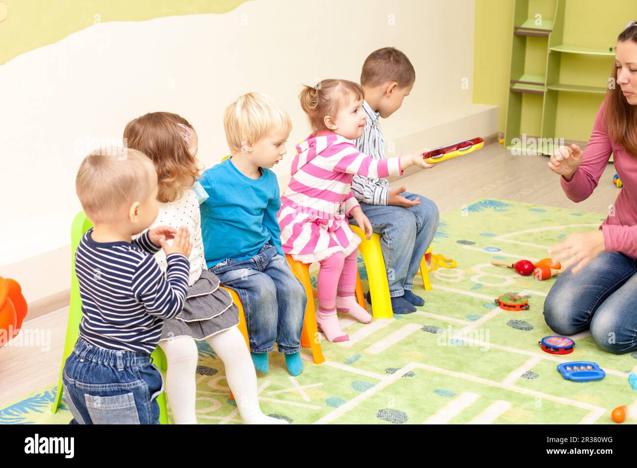 Kindergarten games teacher hi-res stock photography and images - Alamy