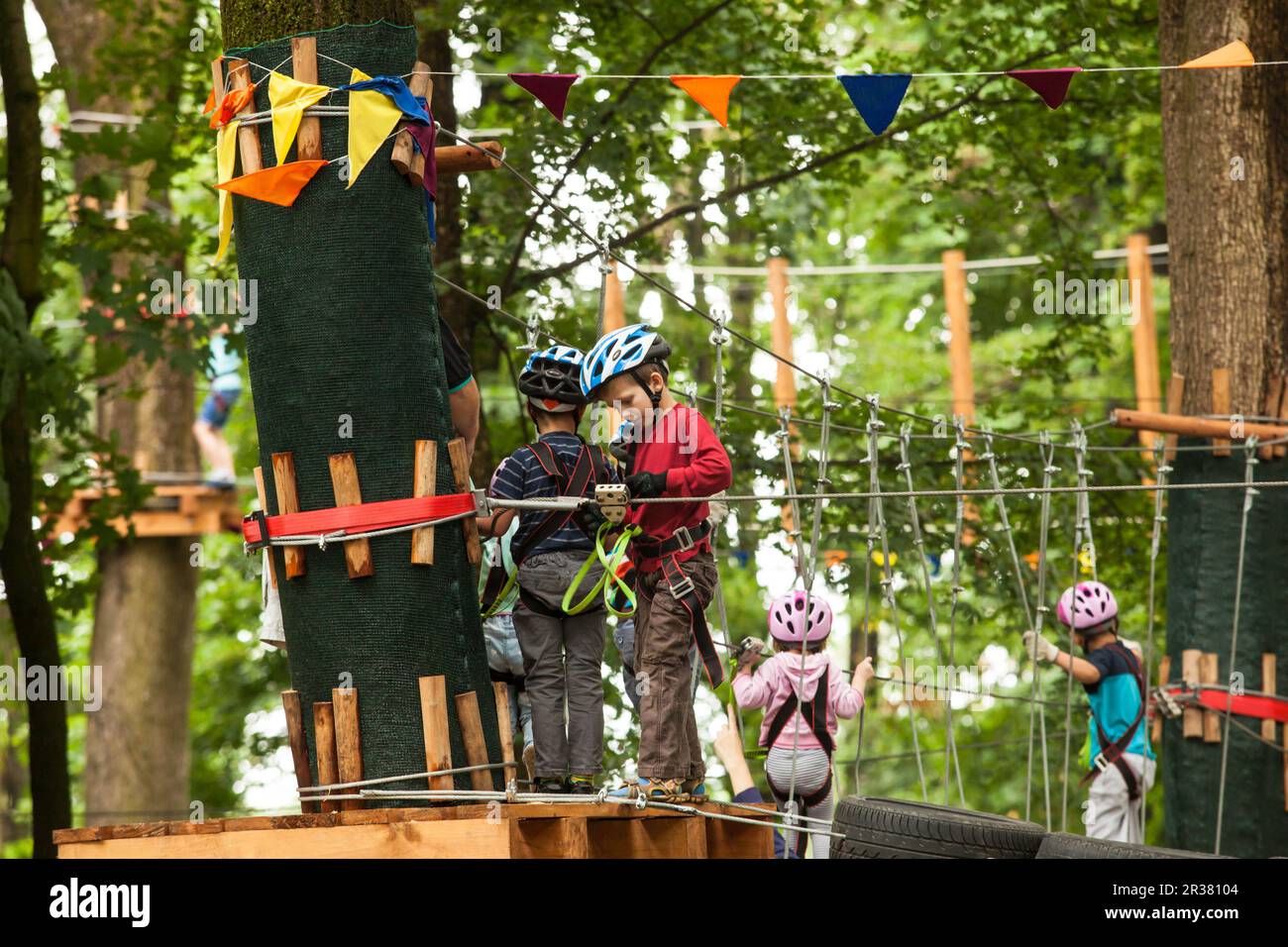 Child in a adventure playground Stock Photo - Alamy