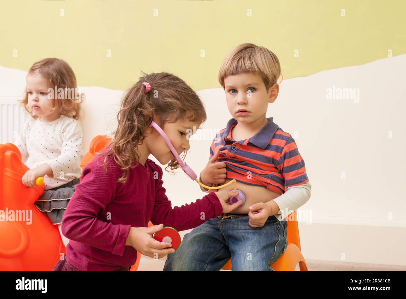 Children playing doctor and patient Stock Photo - Alamy