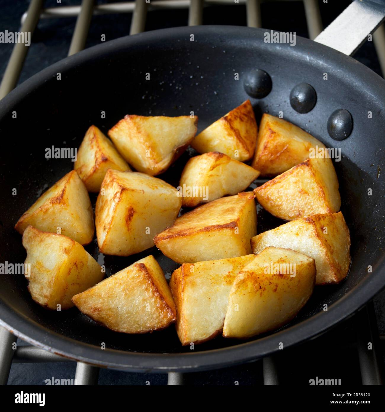 Diced potatoes fried in pan hi-res stock photography and images - Alamy