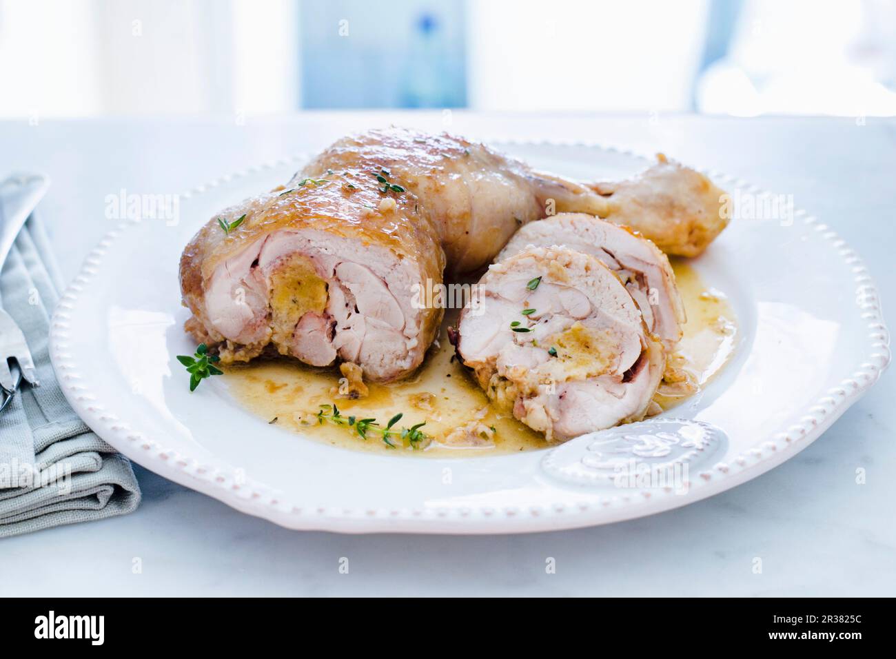 Chicken legs with bread and mushroom stuffing Stock Photo - Alamy