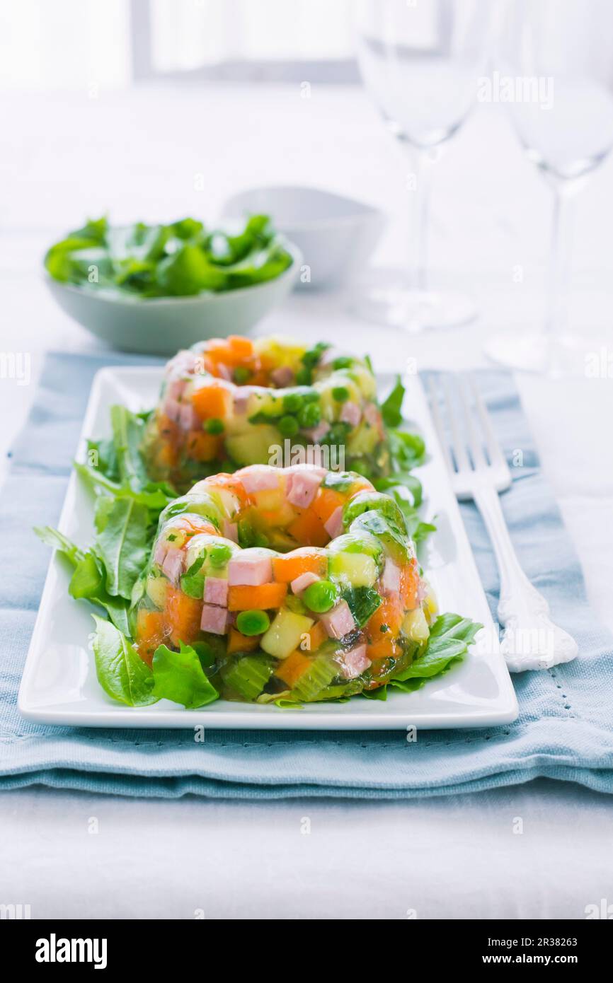 Vegetable salad in jelly Stock Photo - Alamy