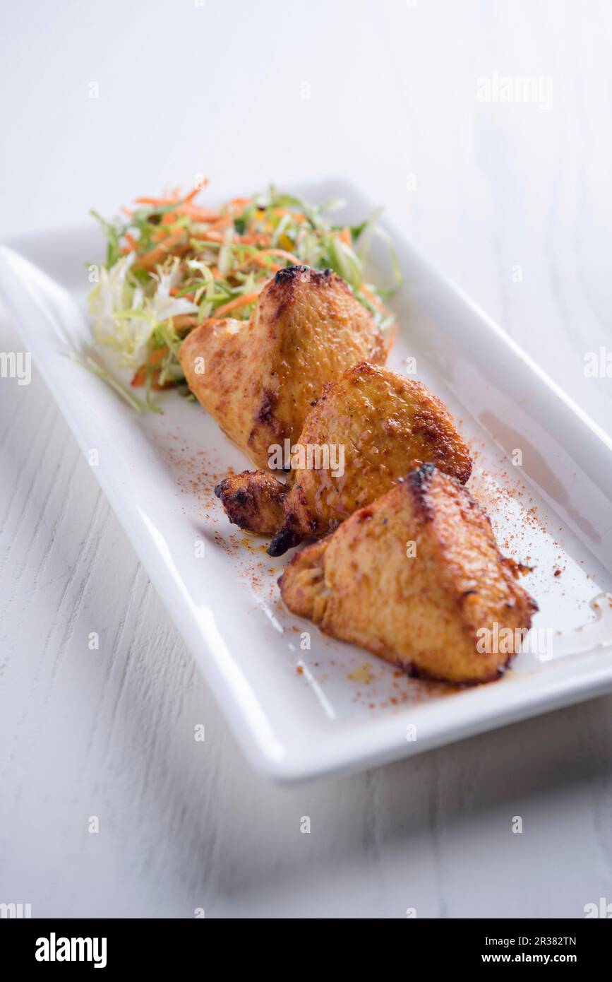 Achari chicken tikka (Indian-style spicy marinated chicken Stock Photo ...