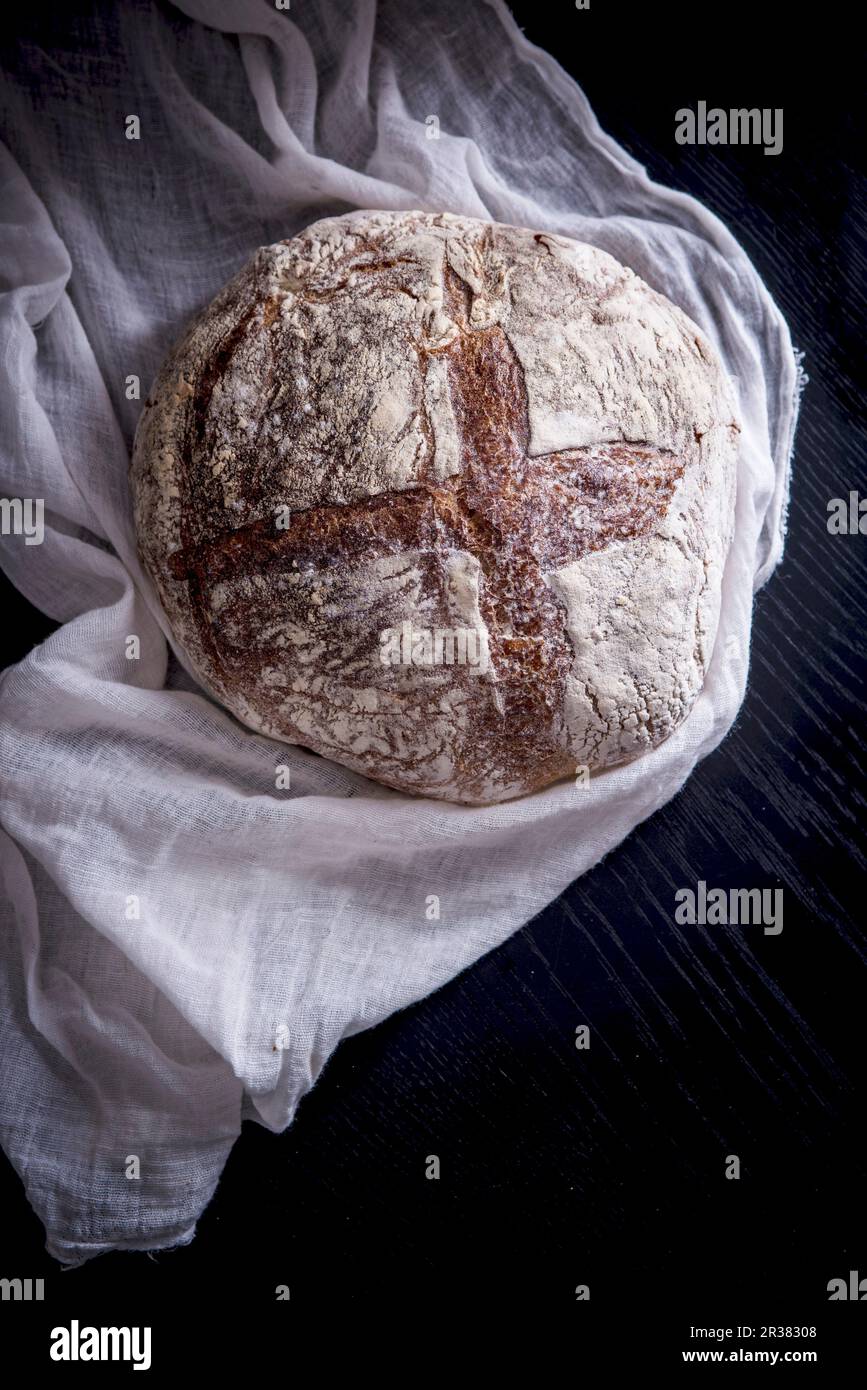 Sourdough bread on a muslin cloth Stock Photo - Alamy