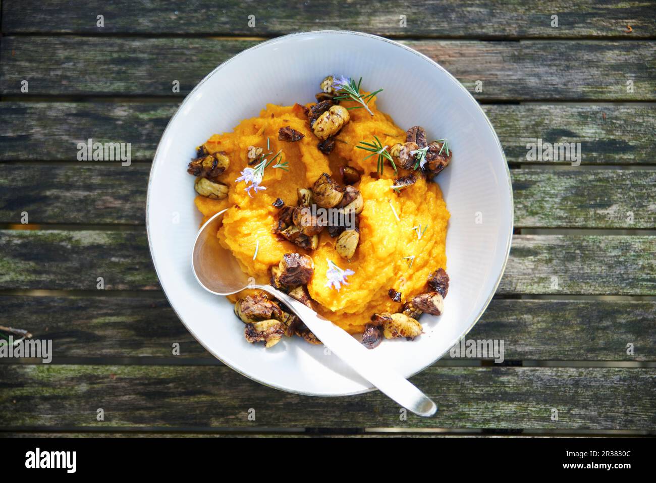 Oven-roasted pumpkin mash with chestnuts Stock Photo - Alamy