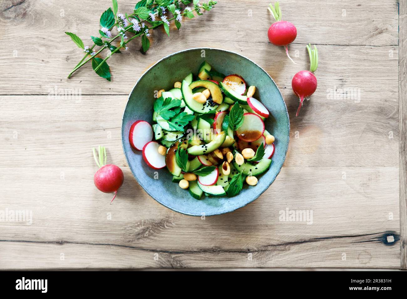 Radish and cucumber salad with mint Stock Photo - Alamy