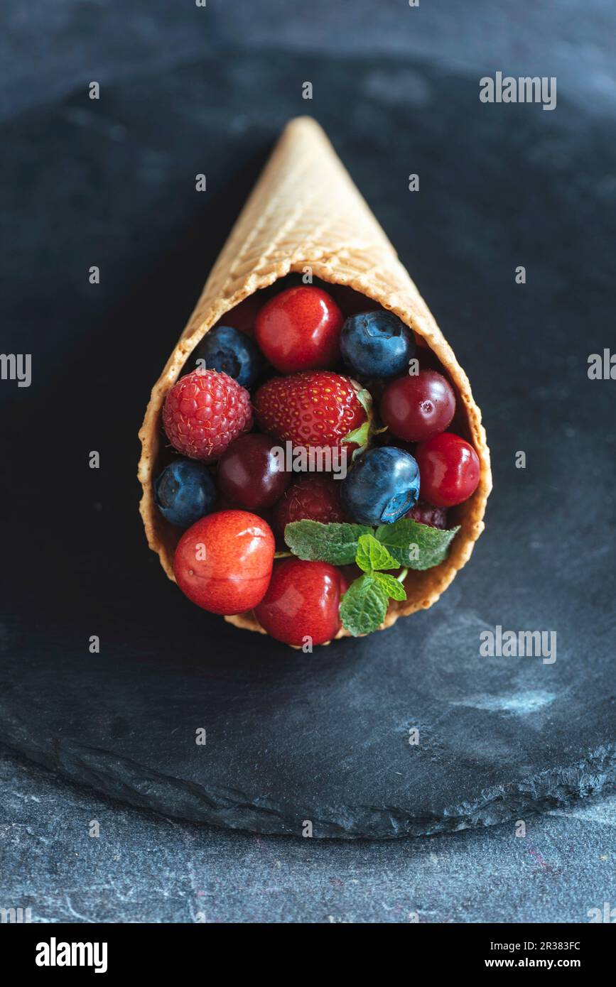 Strawberry ice cream cone ground hi-res stock photography and images ...