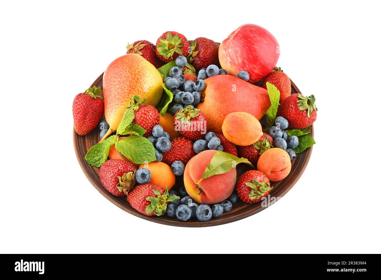 Fruits and berries mix in ceramic plate isolated on white Stock Photo ...