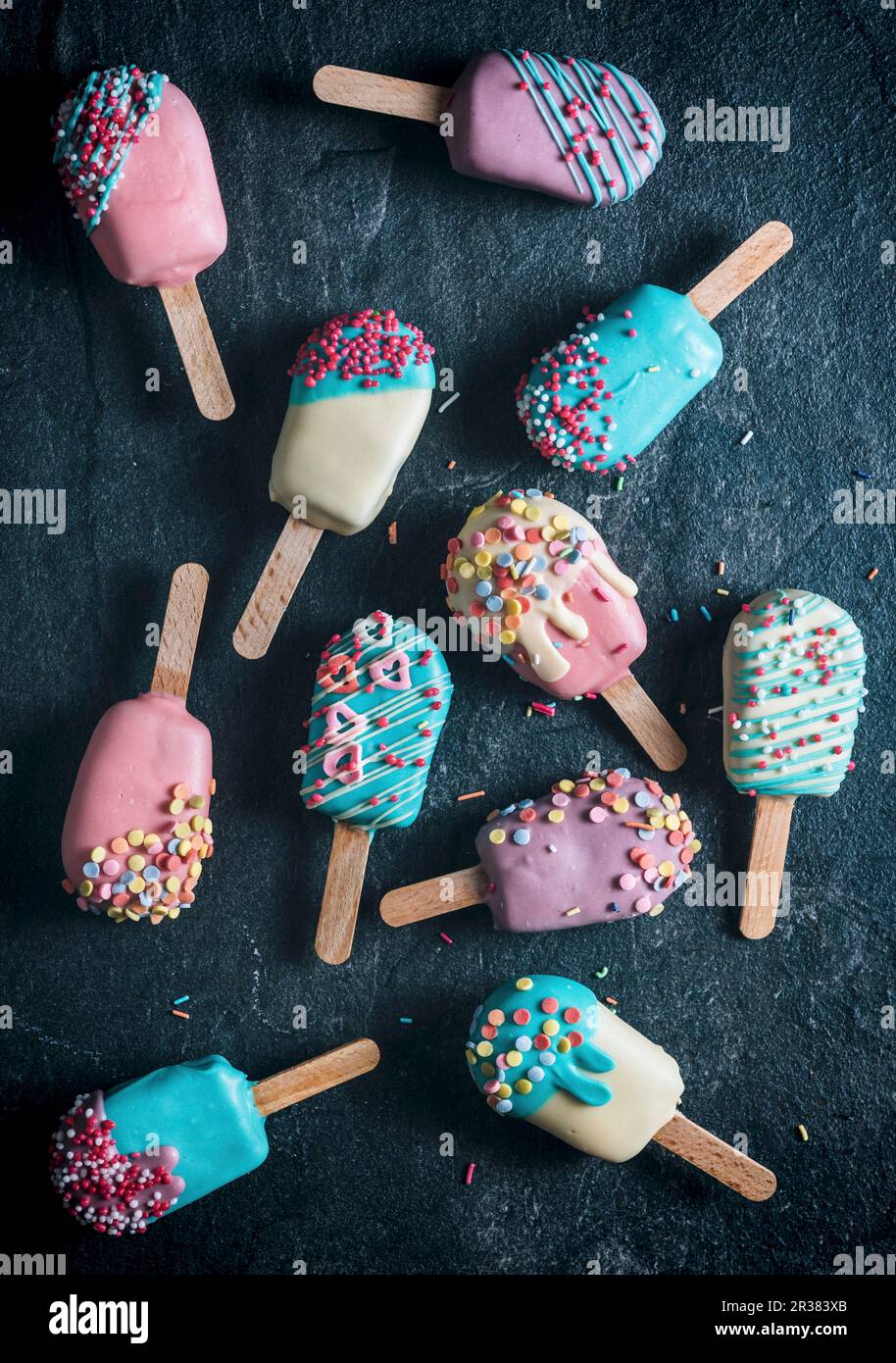 Cake pops in the shape of ice lollies with brightly coloured icing ...