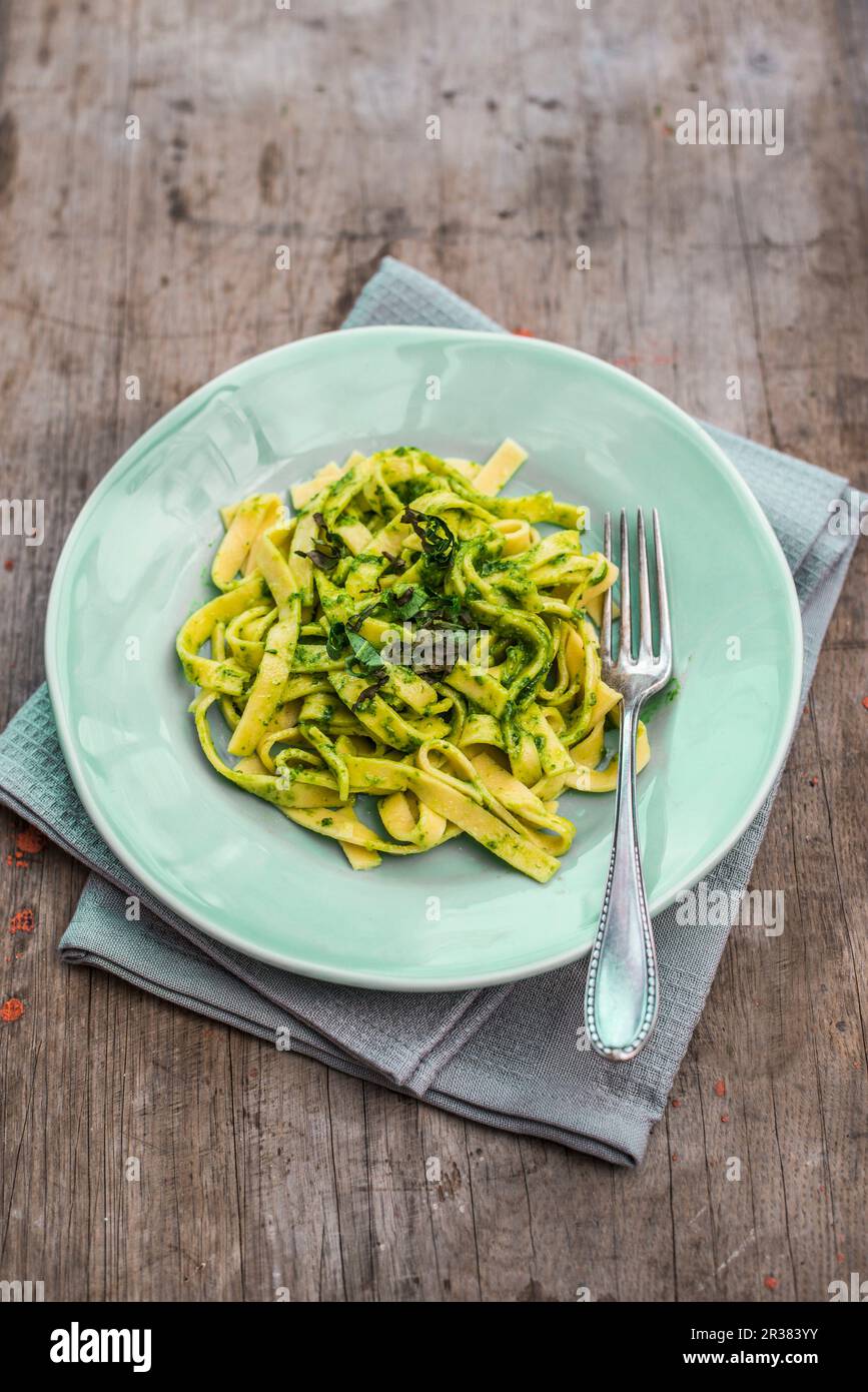 Ribbon pasta with ramsons (wild garlic) pesto Stock Photo - Alamy