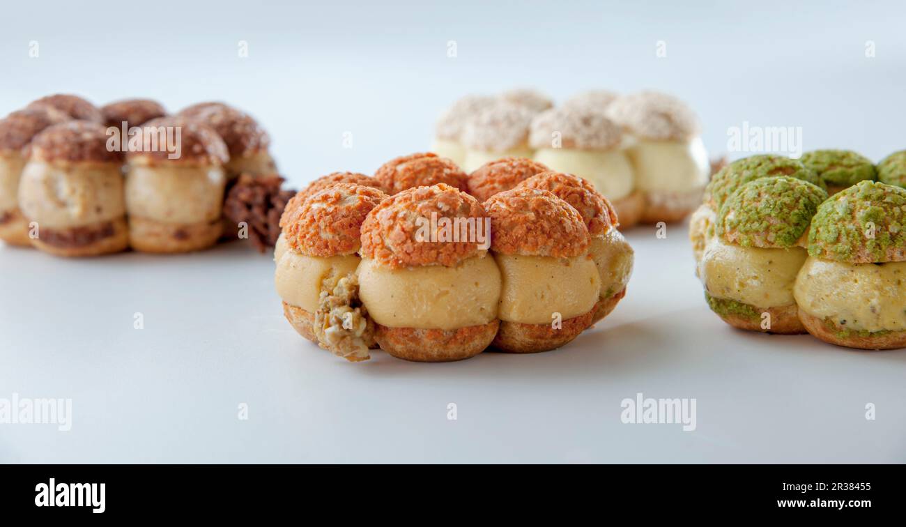 Different kinds of Paris-Brest (choux pastry wth a praline-flavoured ...