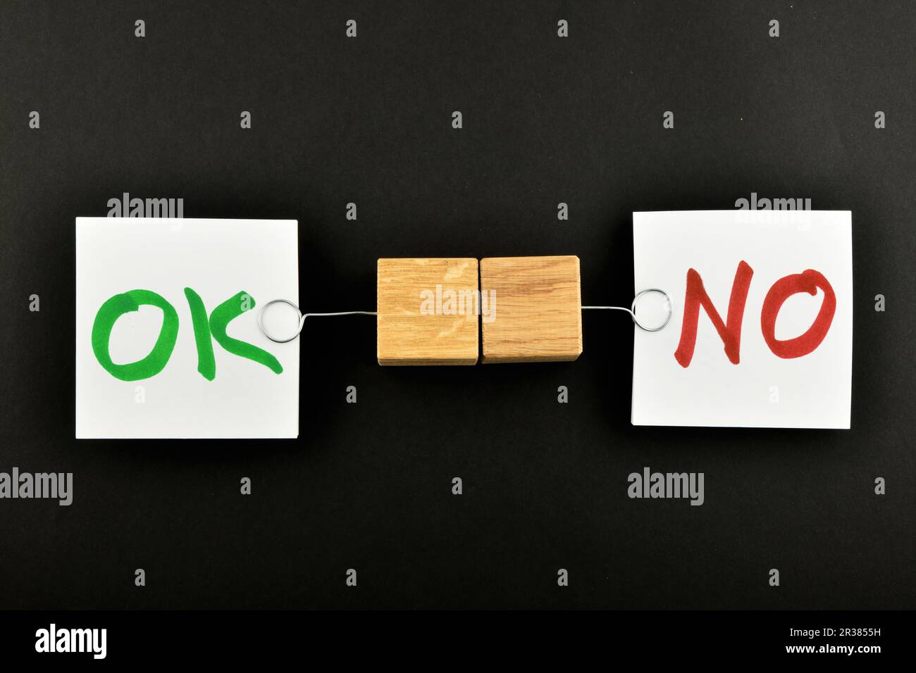 Ok no, two paper notes on black background for presentation Stock Photo ...